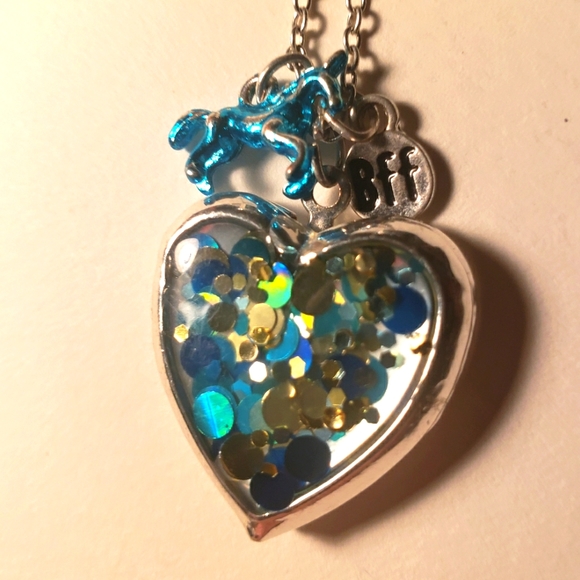 Charming Charlie | Jewelry | Charming Charlie Silvertone Heart Locket ...